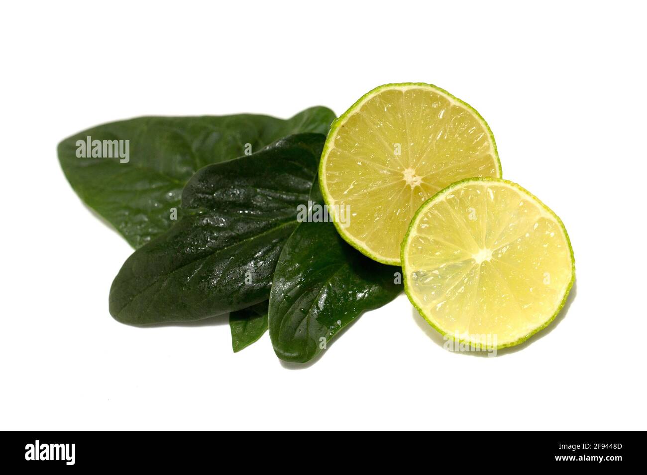 Fresh lime fruit. Whole fruits and cut. Lime leaves. White background ...