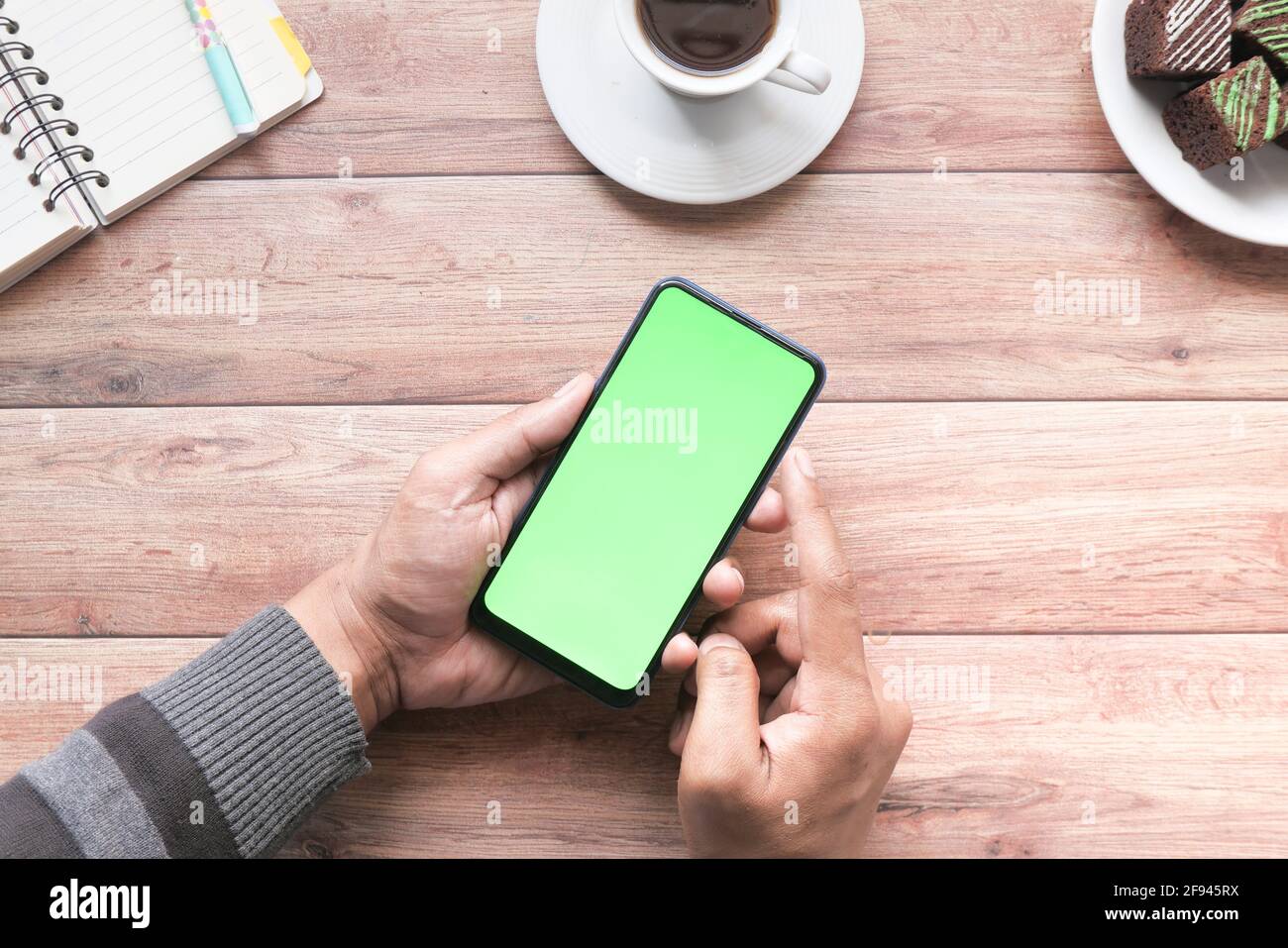 Man scrolling phone green screen hi-res stock photography and images ...