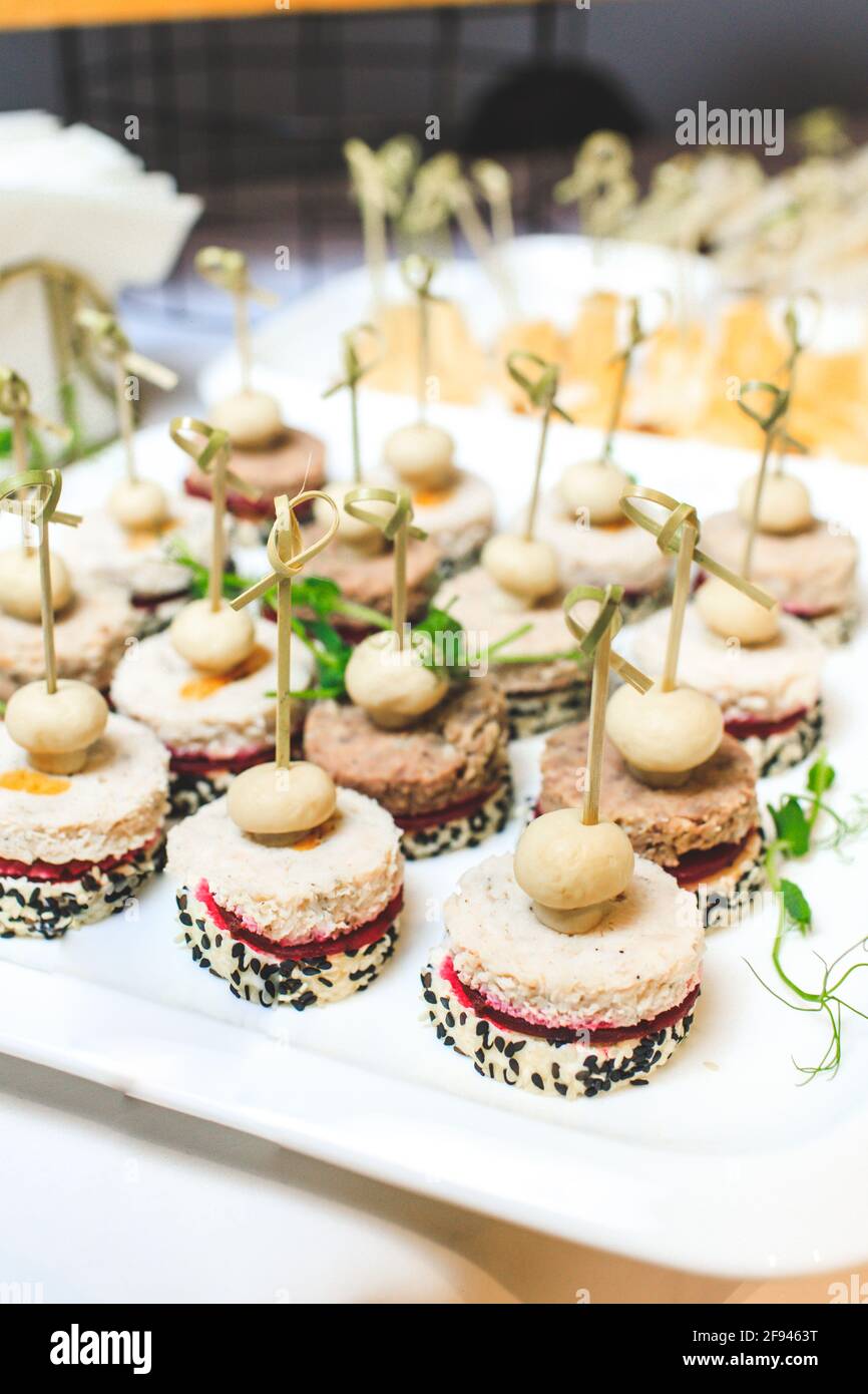 Catering service. Snacks for guests on the table Stock Photo - Alamy