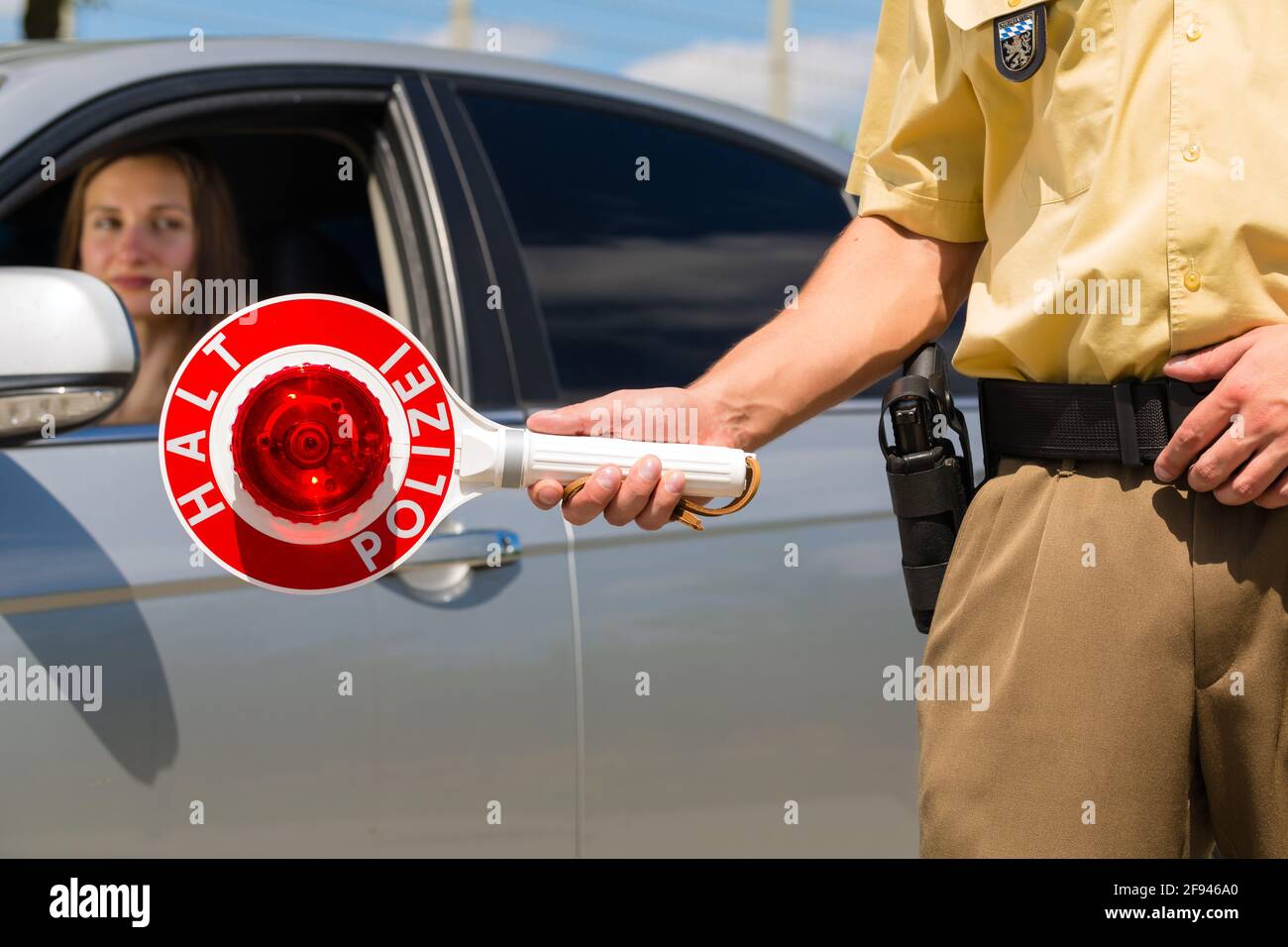 Police - policeman or cop in uniform stop car in traffic control Stock ...