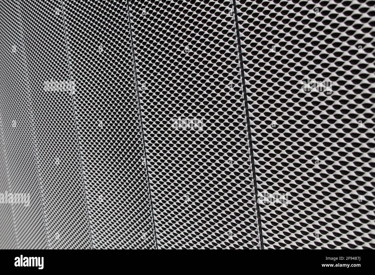 Metal mesh grey surface, background, close-up Stock Photo - Alamy