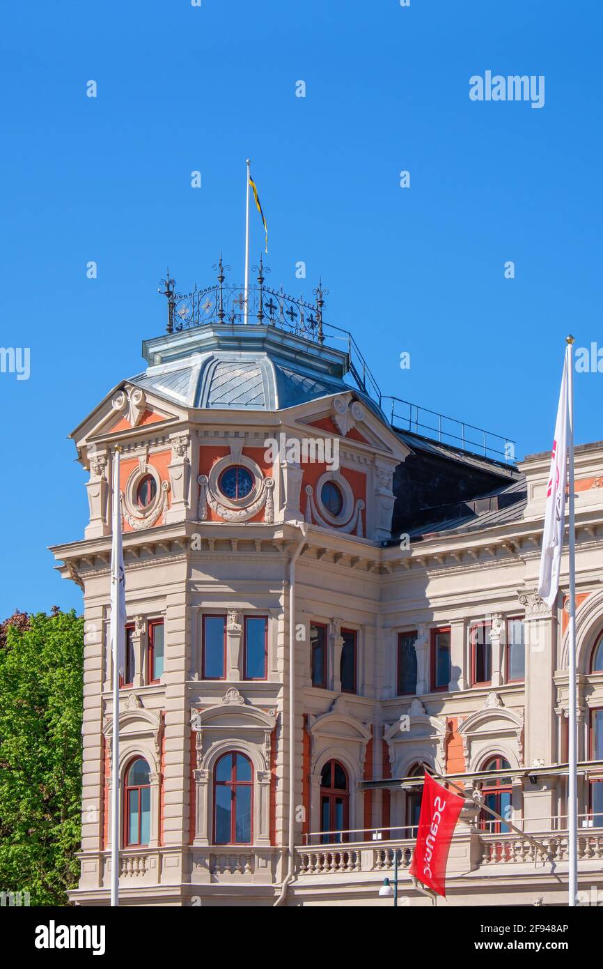 Old beautiful building with a tower Stock Photo - Alamy