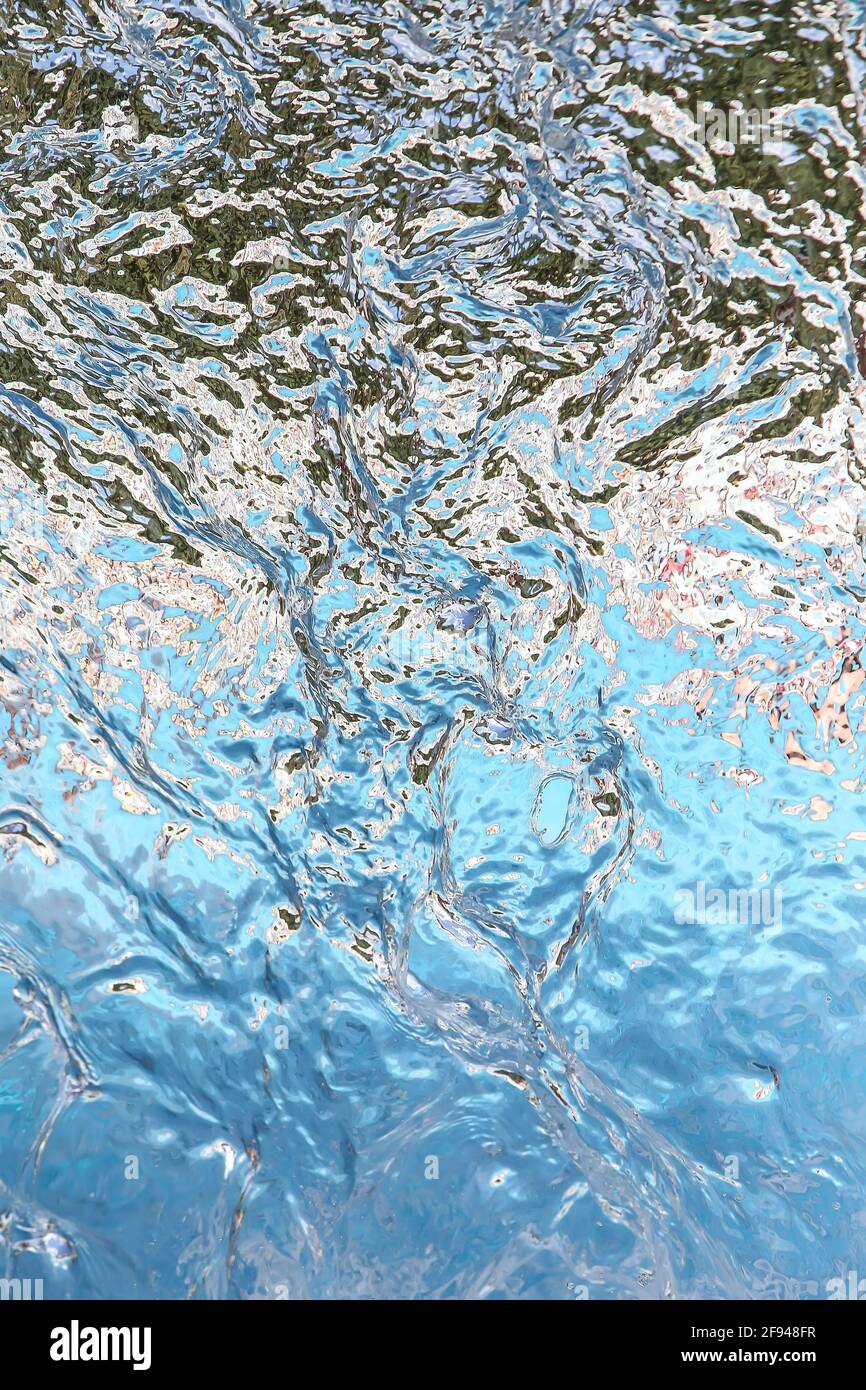 flow of water on a smooth surface. Background Stock Photo - Alamy