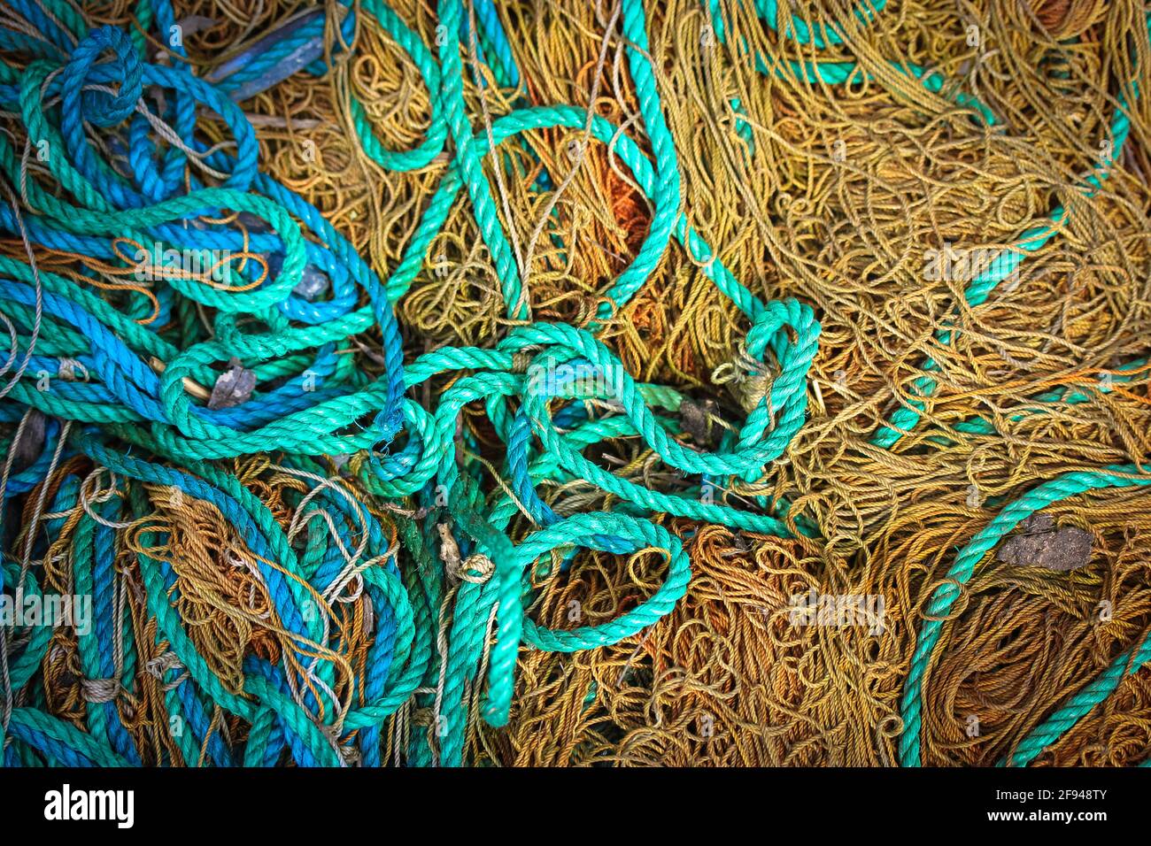Various rough ropes scattered in a chaotic order, view from above ...