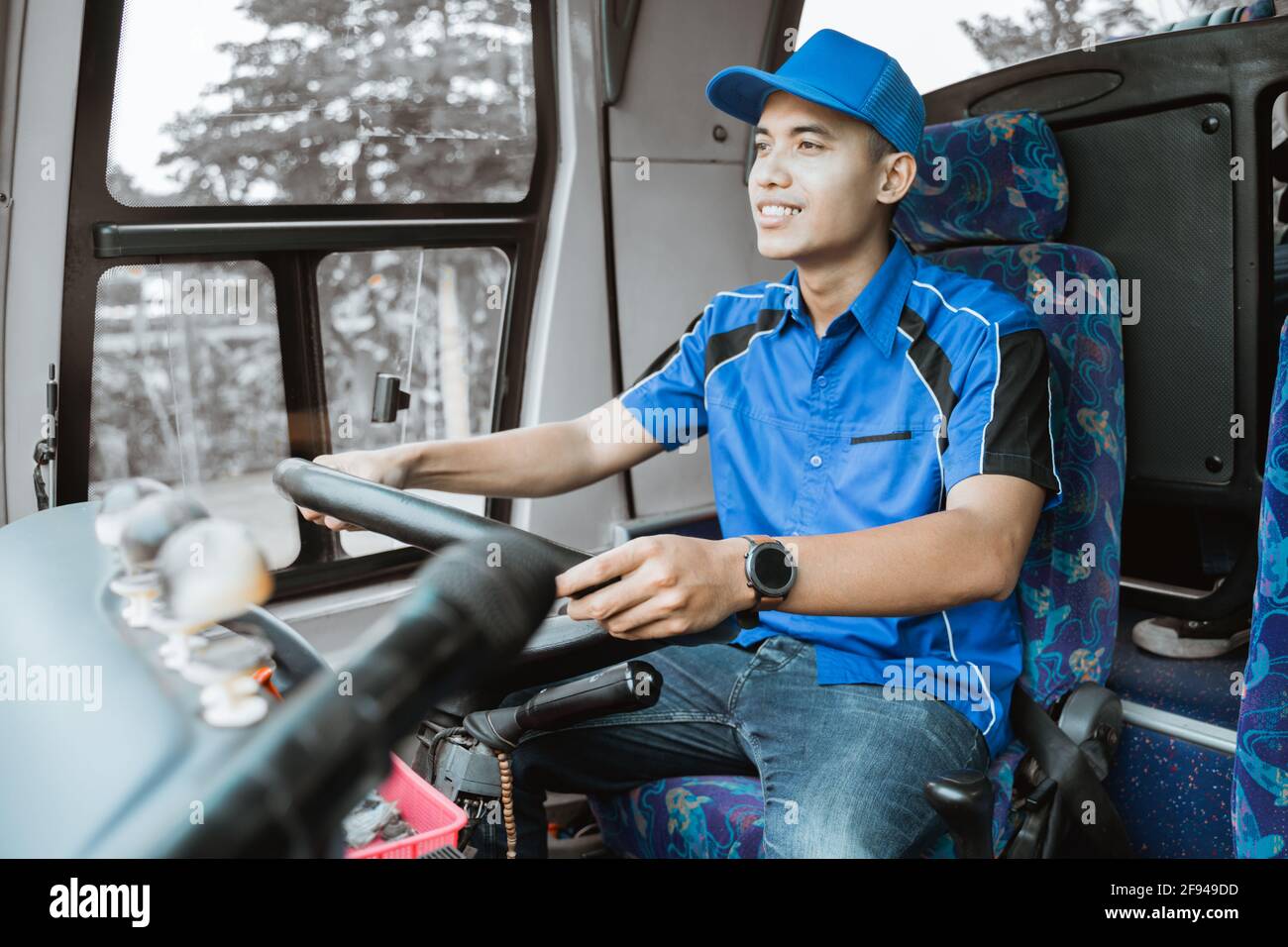 A Male Bus Driver Is Driving The Bus Stock Photo Alamy a-male-bus-driver-is-driving-the-bus-stock-photo-alamy