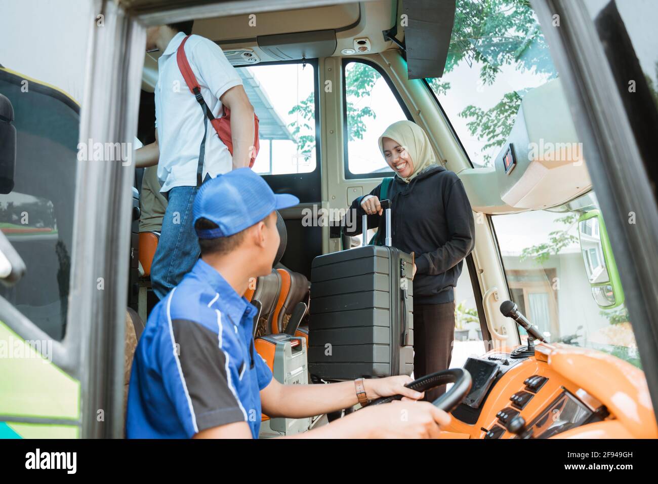 the bus driver turned to see a woman in a veil carrying a suitcase ...