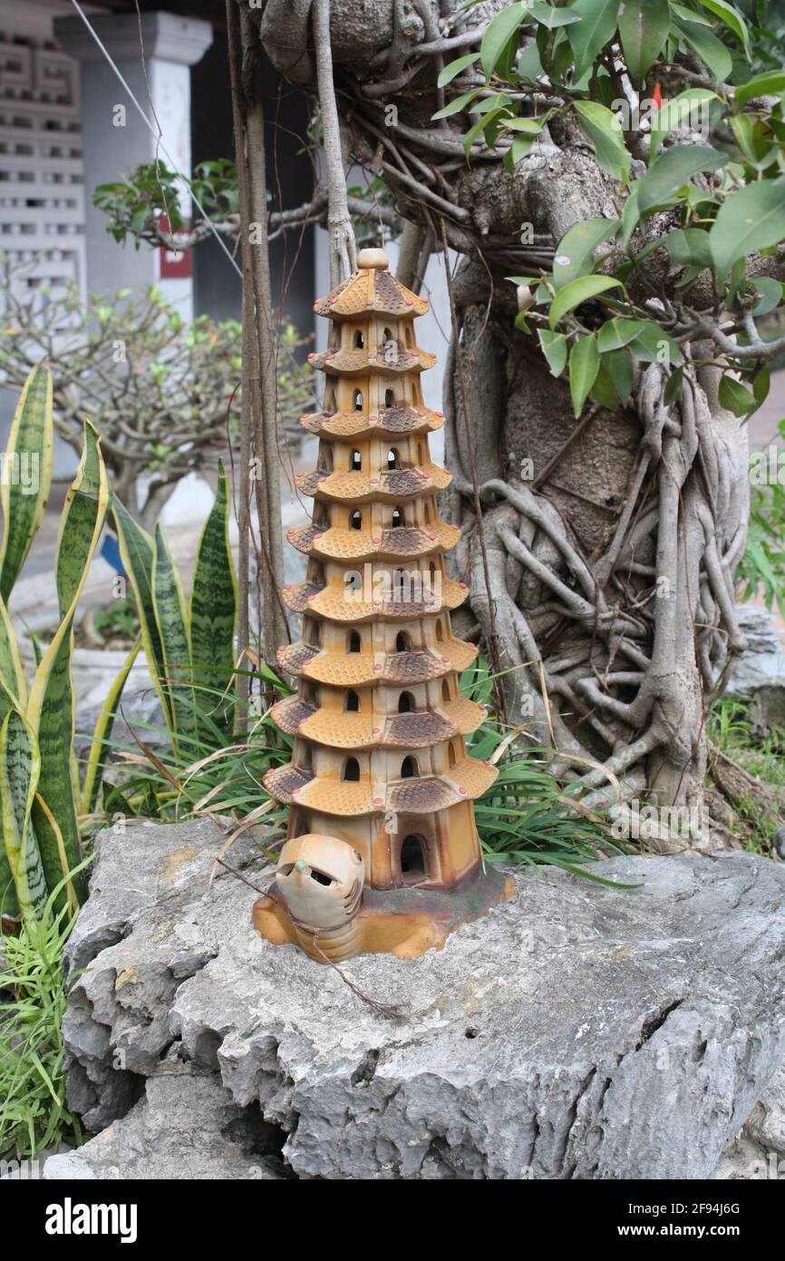 Close-ups of intricate pottery works for the public depicting miniature ...