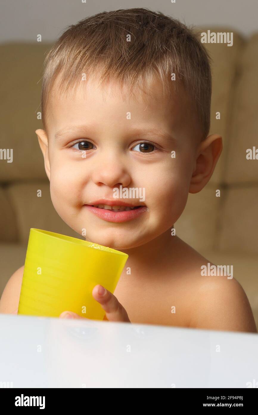 Drinking beaker boy hi-res stock photography and images - Alamy