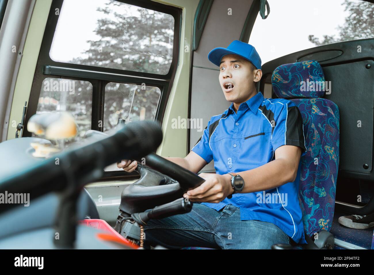 Male bus driver hi-res stock photography and images - Alamy