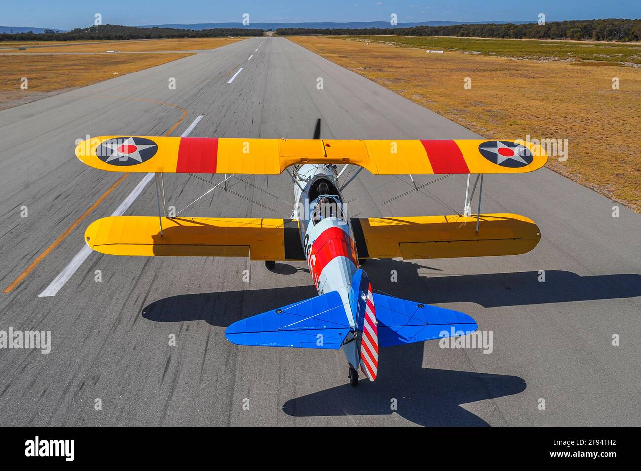 A rear view of a restored 1930's Boeing Stearman biplane in US Navy ...