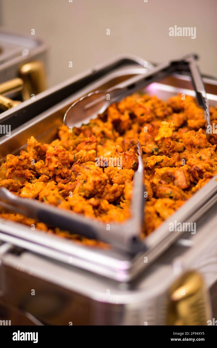 Vertical shot of a traditional Indian food in a metal container Stock ...