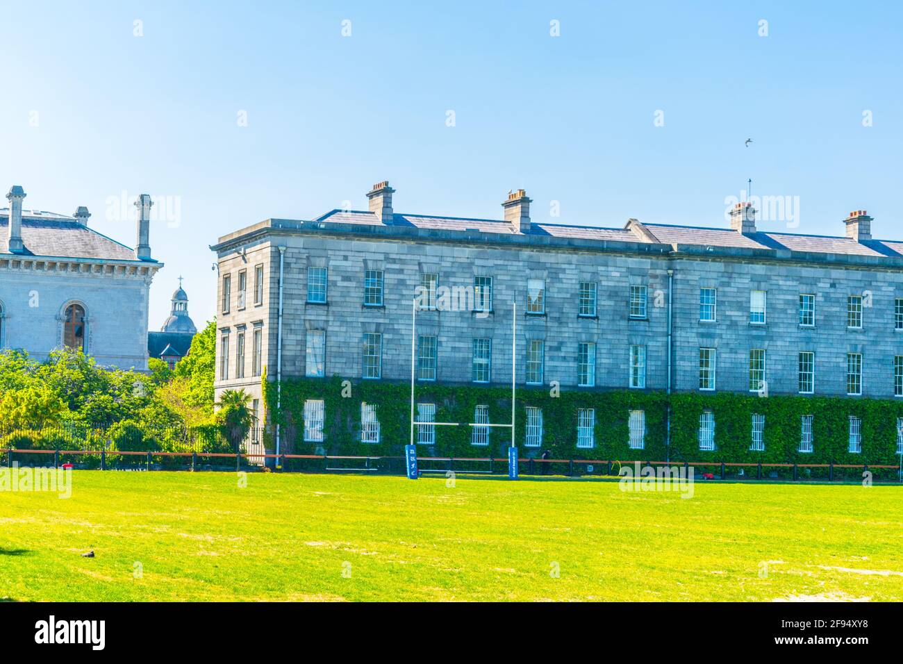 View of a building inside of the trinity college campus in Dublin ...