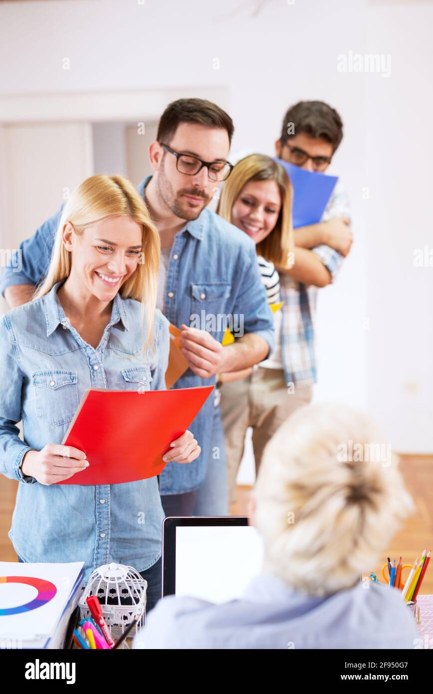 People standing waiting in line for job interview hi-res stock ...