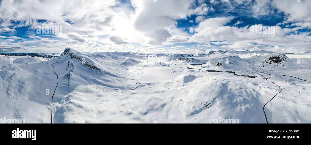 Spectacular panoramic view over snowcapped mountain peaks Stock Photo ...