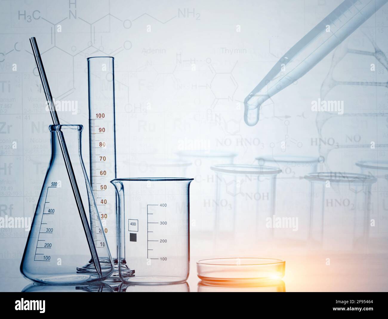 Laboratory glassware containing chemical liquid, science research ...