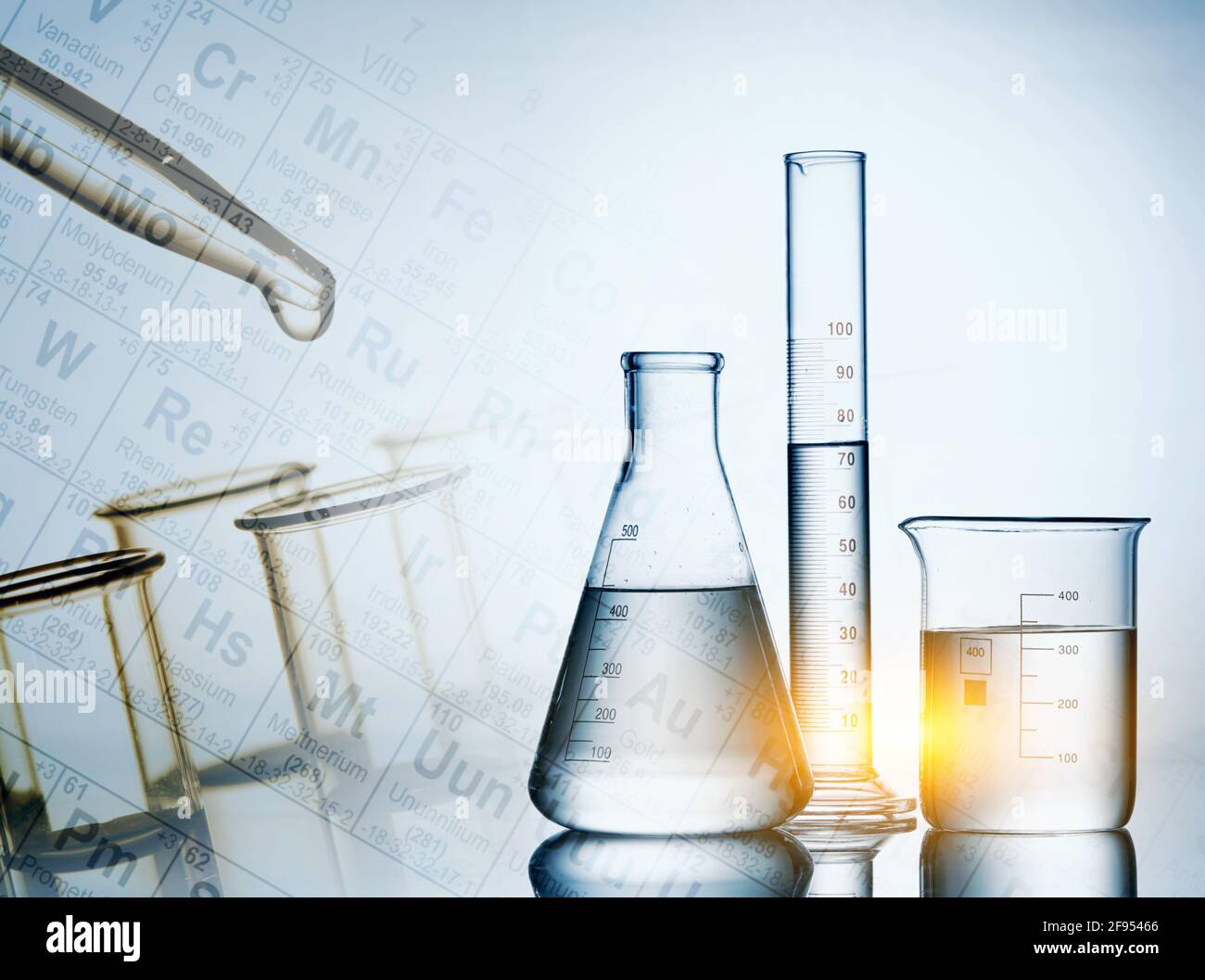 Laboratory glassware containing chemical liquid, science research ...