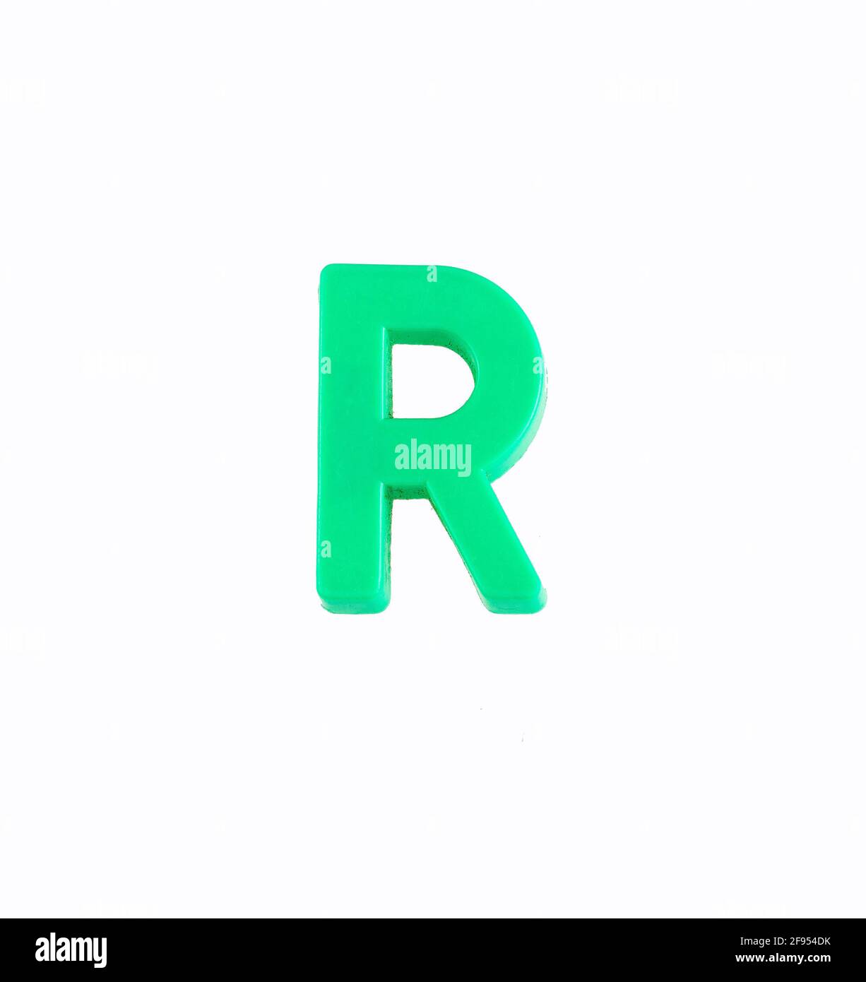 Letter R in green color - Plastic part Stock Photo - Alamy