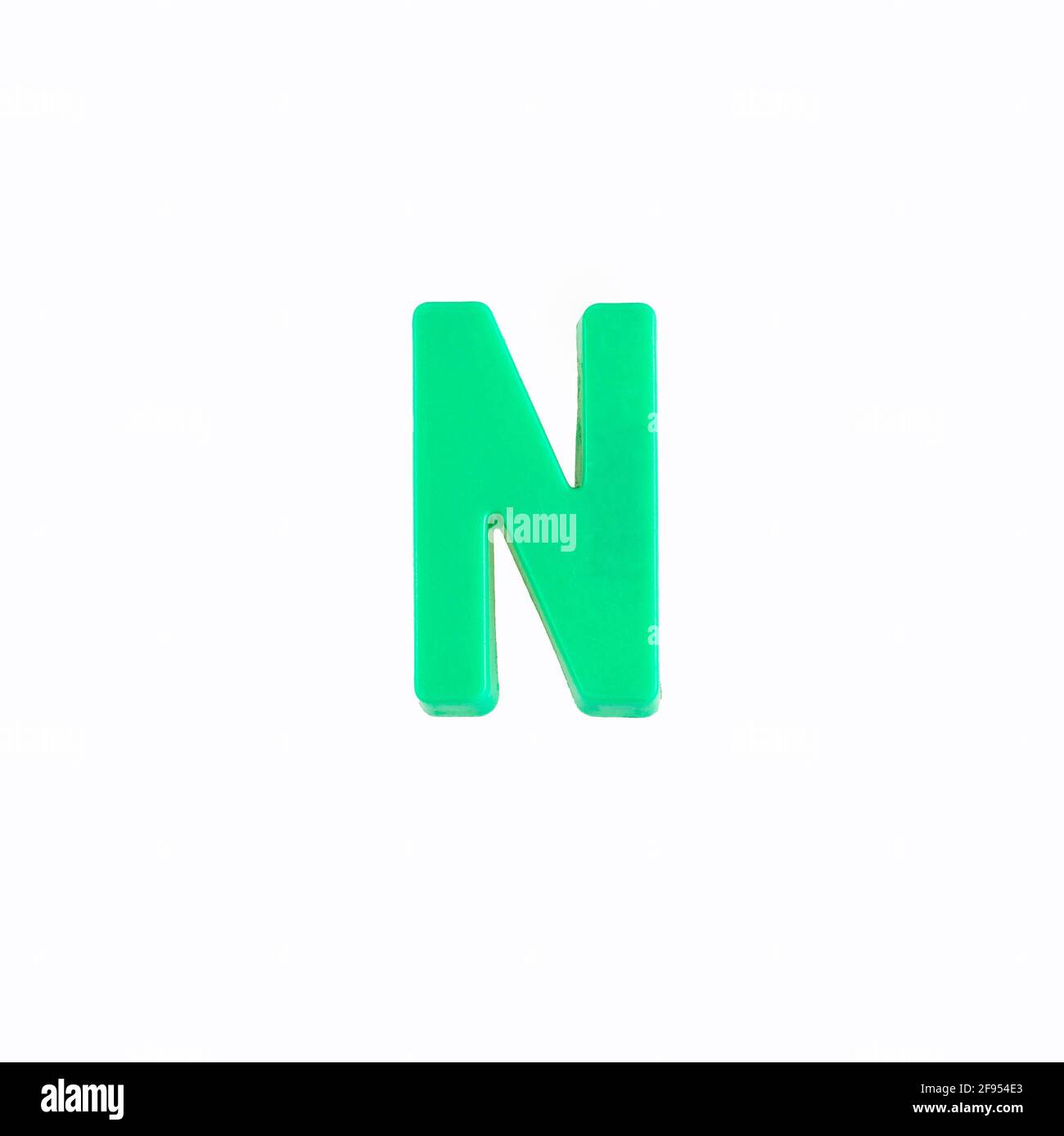 Letter N in green color - Plastic part Stock Photo - Alamy