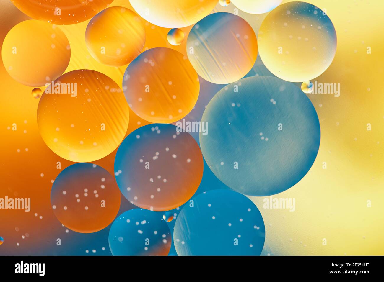 Colorful abstract macro background with oil drops in water Stock Photo ...