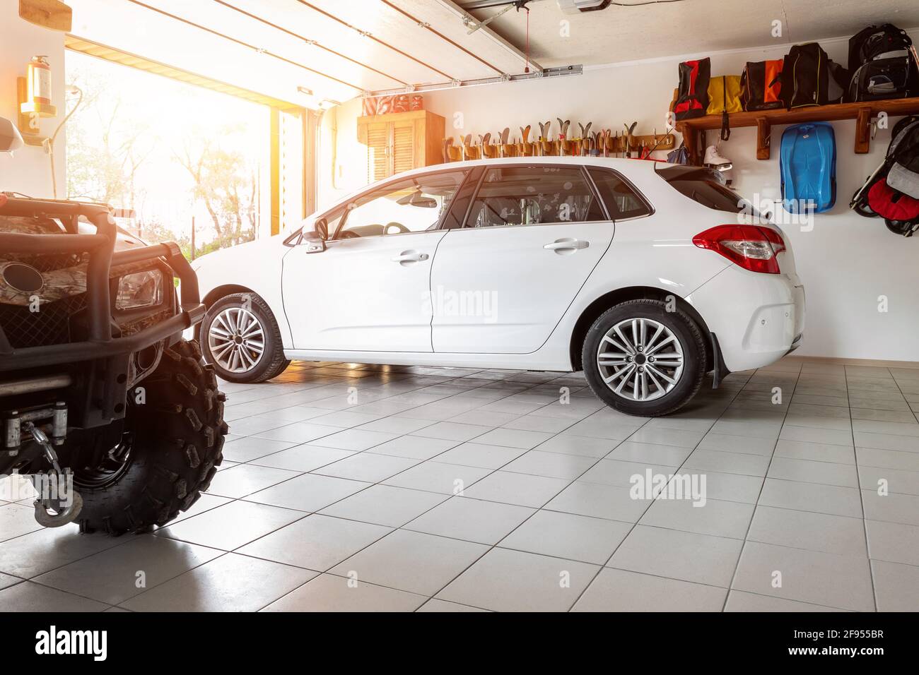Home suburban countryside modern car and ATV double garage interior ...