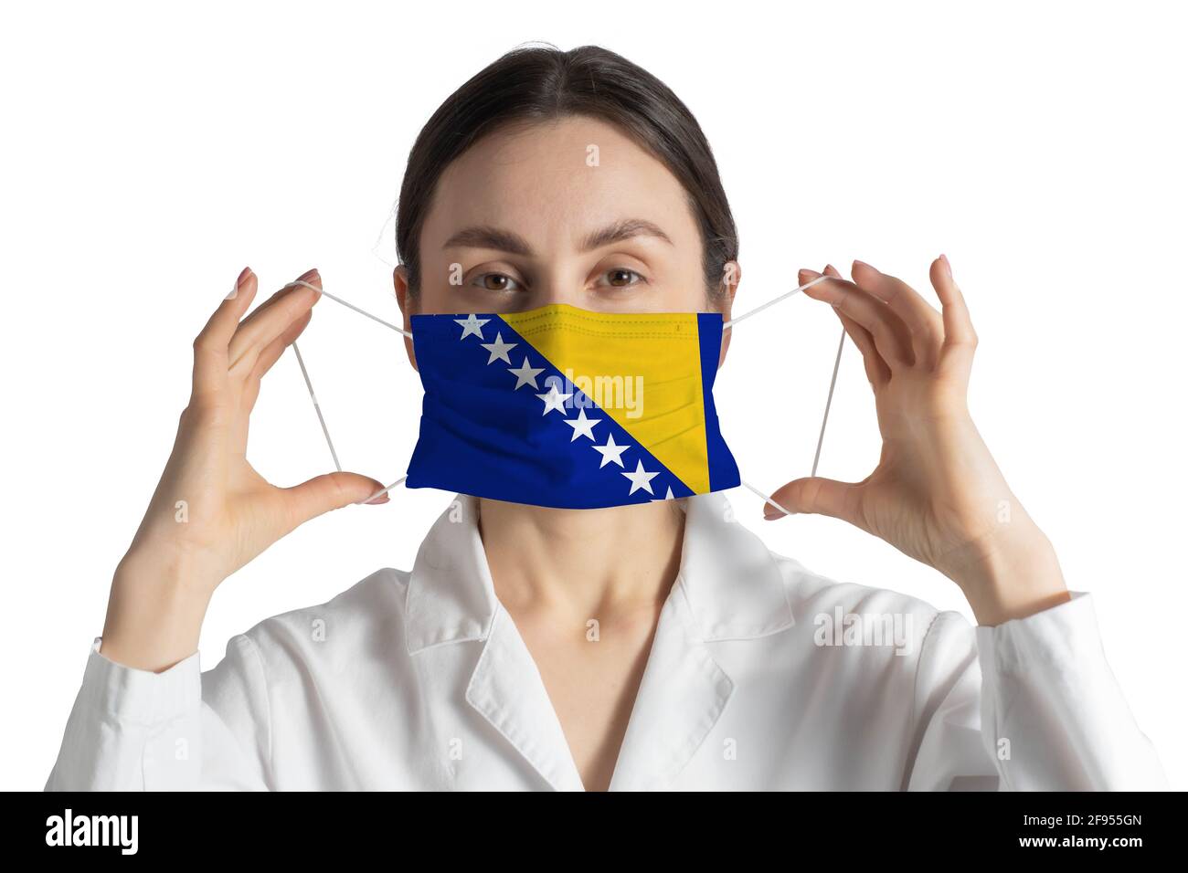 Respirator with flag of Bosnia and Herzegovina Doctor puts on medical ...