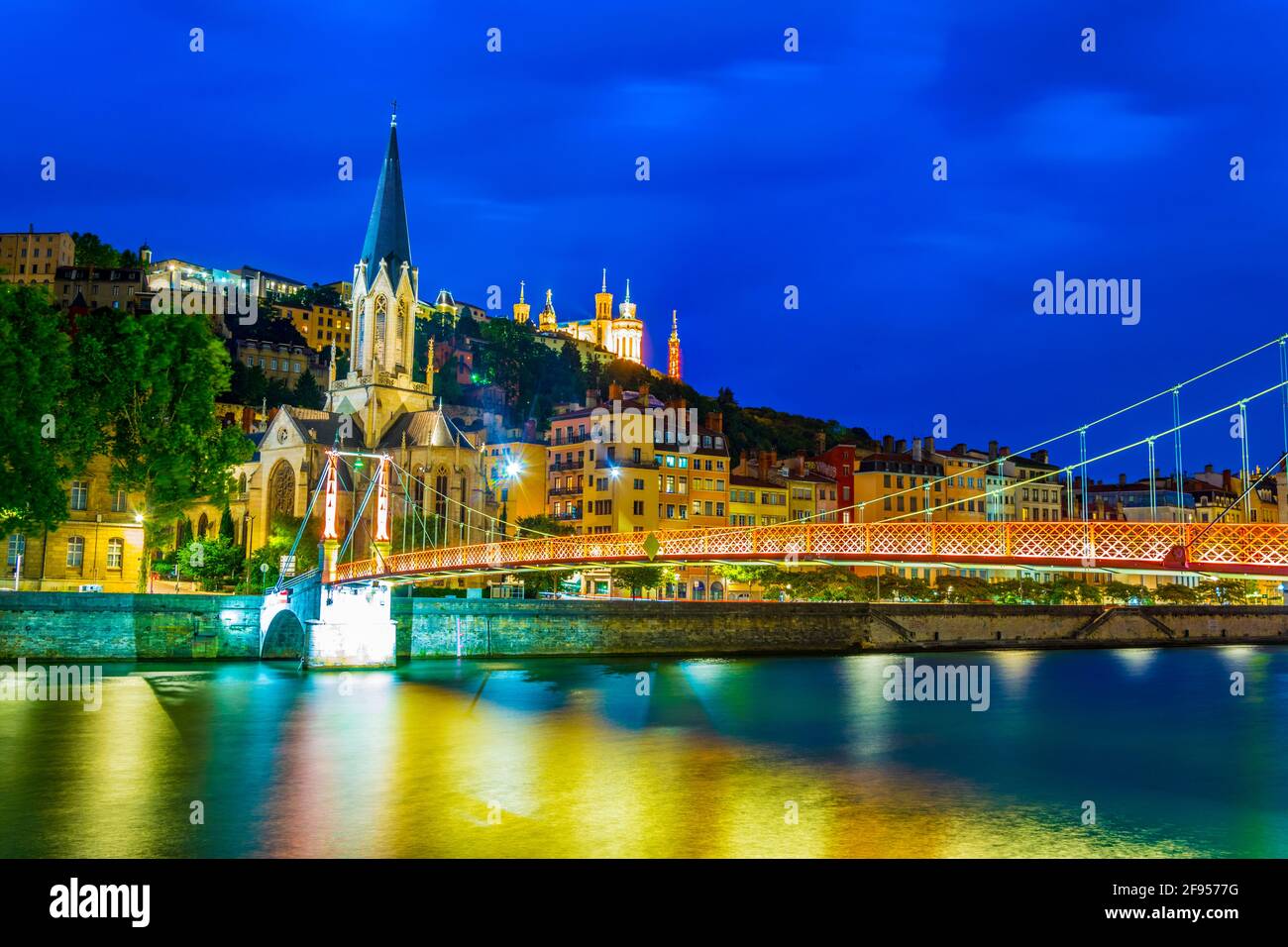 Night view of illuminated basilique de Notre-dame de Fourivere and ...