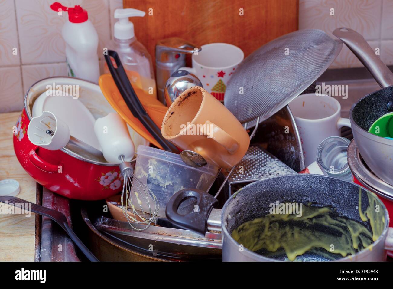Dirty dishes in the sink. domestic kitchen dishes messy housework wash ...