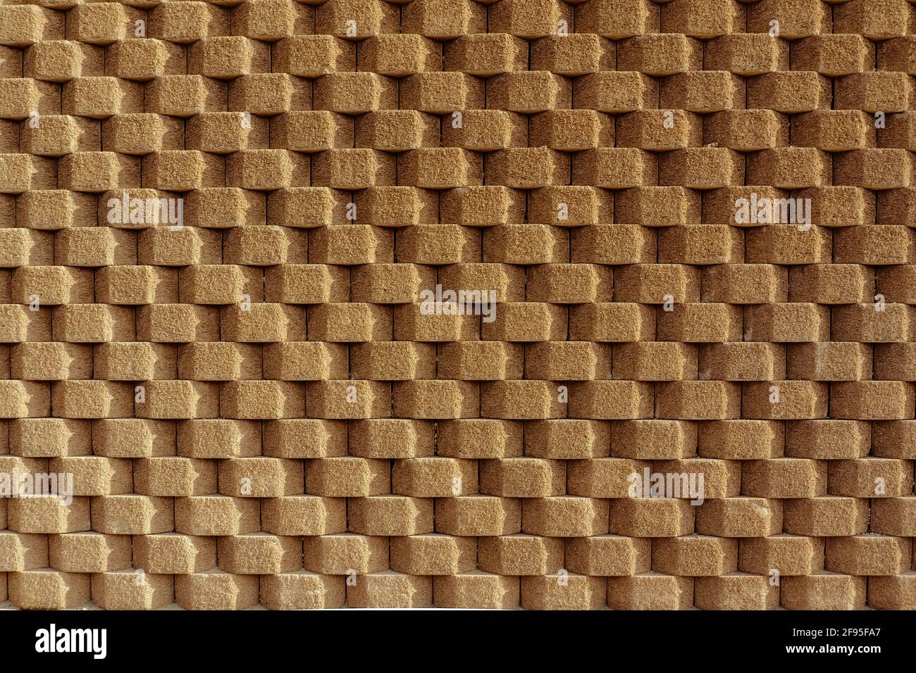 Repetitive pattern wall in brown color Stock Photo - Alamy