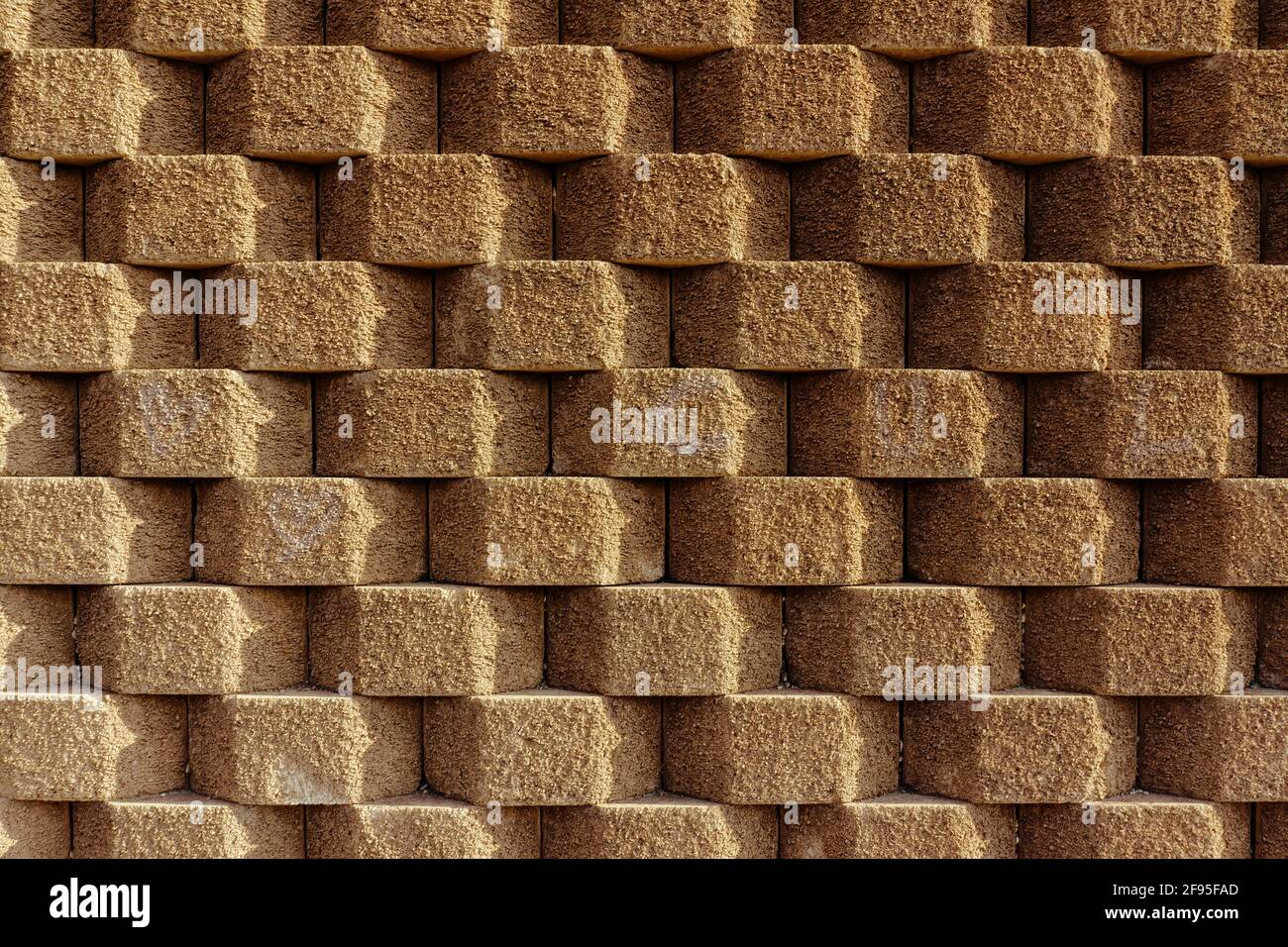 Repetitive pattern wall in brown color Stock Photo - Alamy