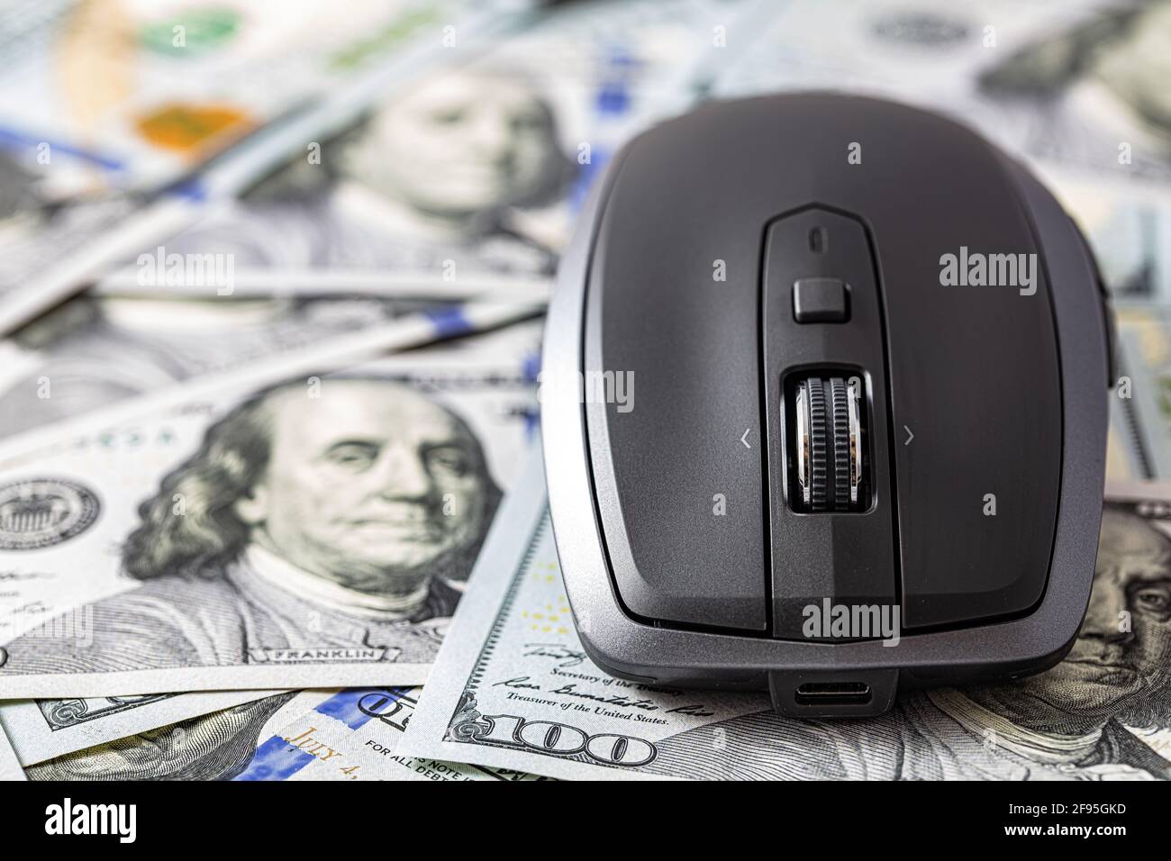 Wireless mobile mouse on 100 dollar background for design purpose Stock ...