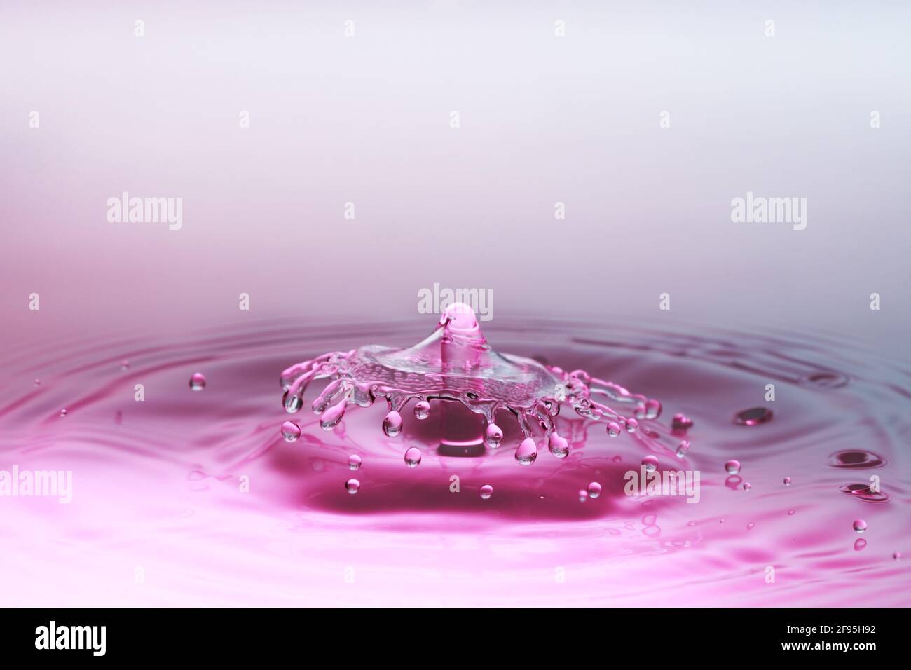 Collision ripple splash of two drops falling into the water Stock Photo ...