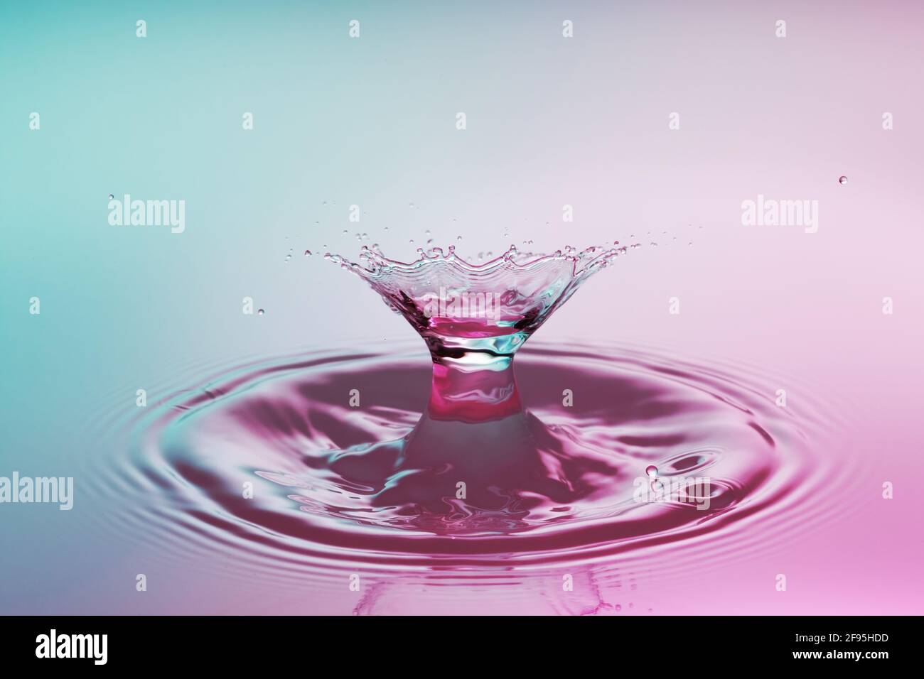 Collision ripple splash of two drops falling into the water Stock Photo ...