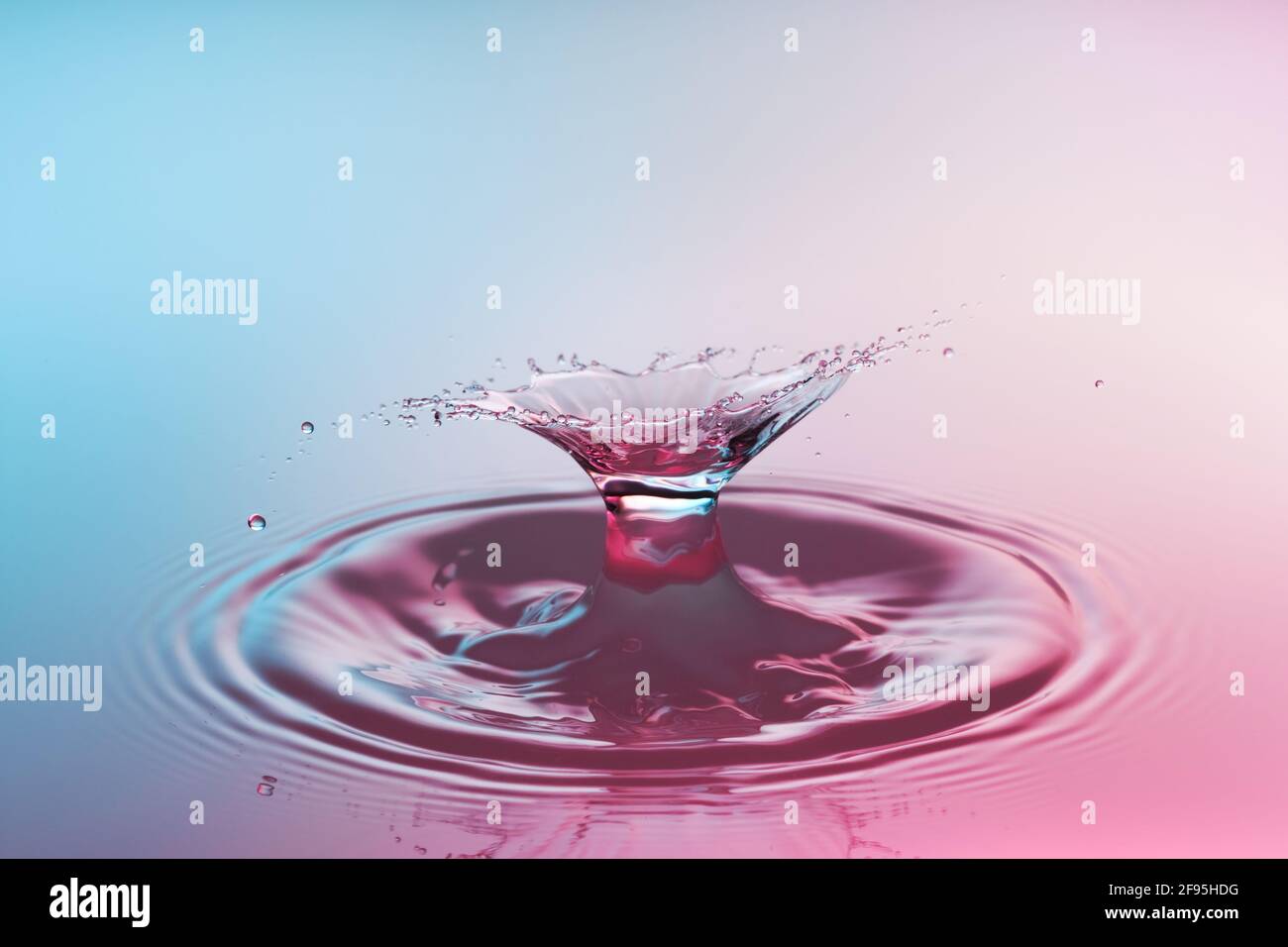 Collision ripple splash of two drops falling into the water Stock Photo ...
