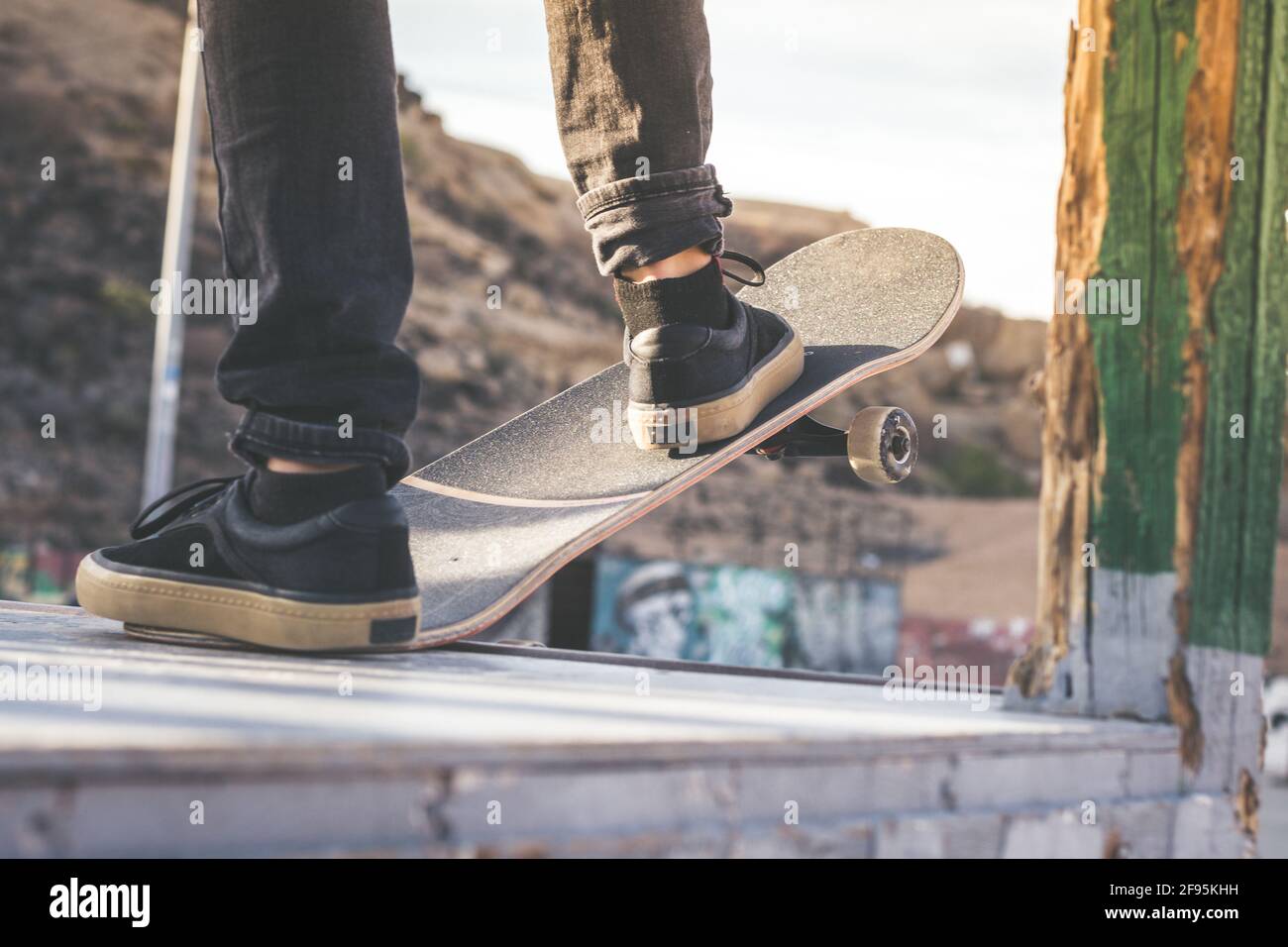 Young man jumping over railing hi-res stock photography and images - Alamy