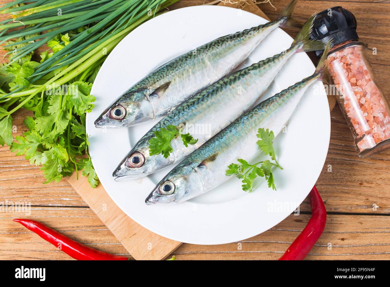 raw mackerel with and spices Stock Photo - Alamy