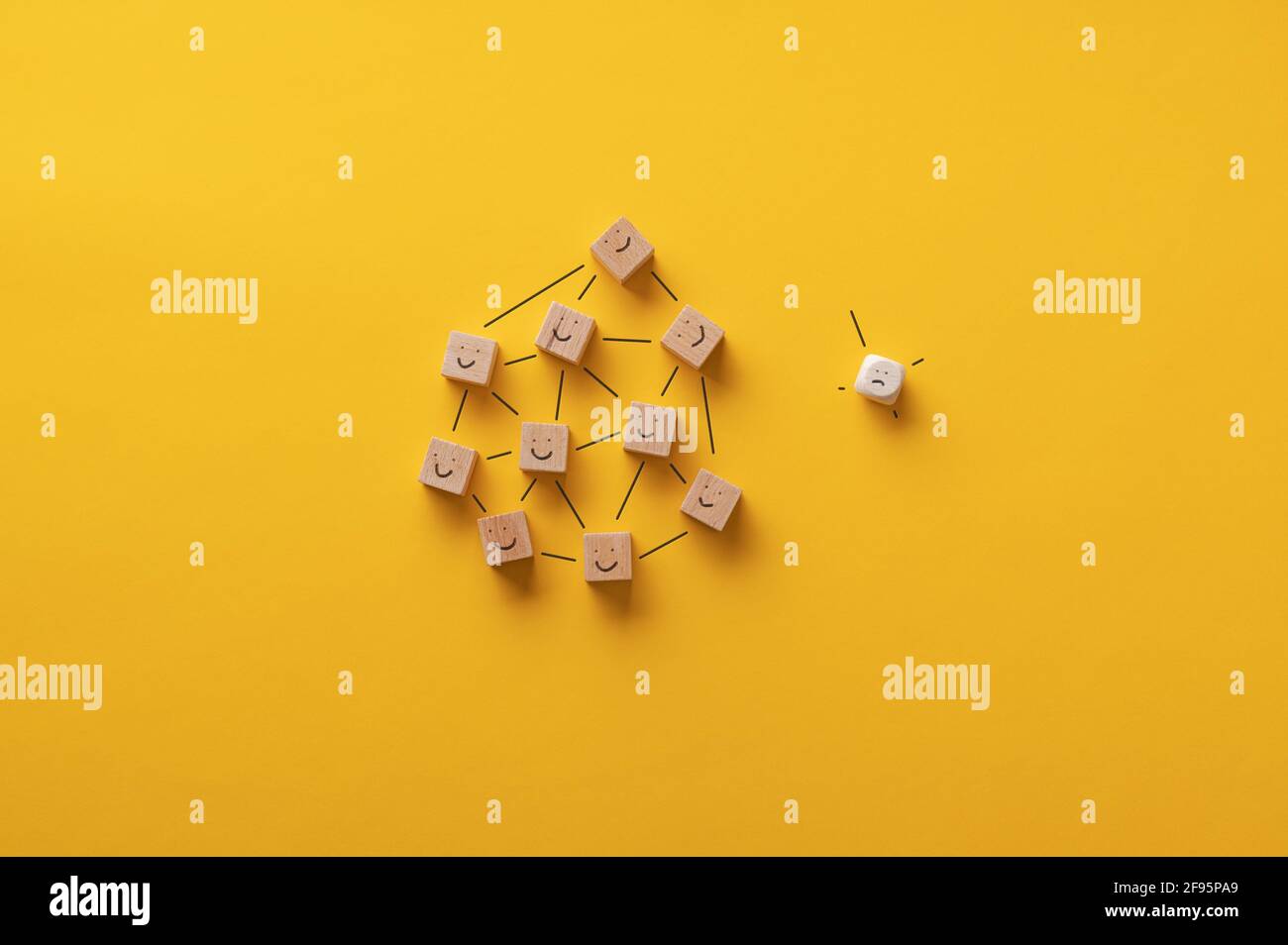 Social isolation and loneliness conceptual image. Over yellow ...