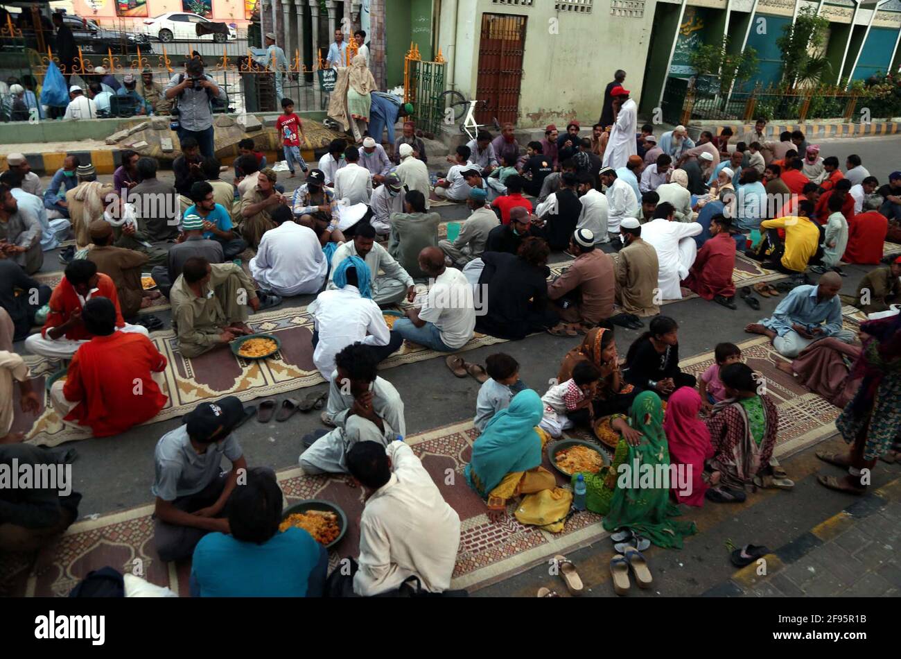 Faithful Muslims are breaking the fast (Iftar) during the Holy month of ...