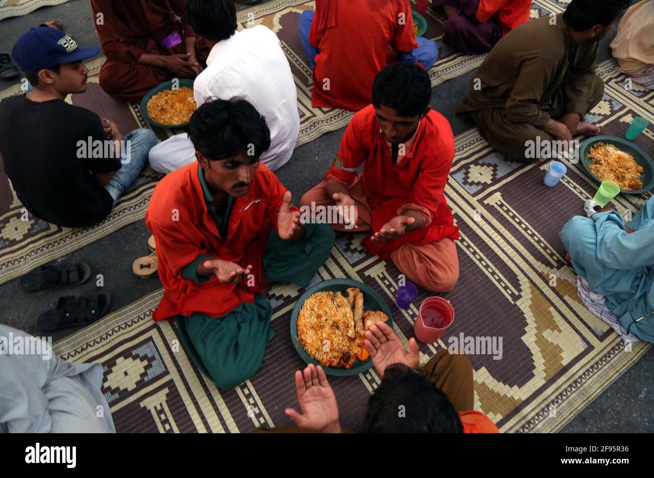Faithful Muslims are breaking the fast (Iftar) during the Holy month of ...