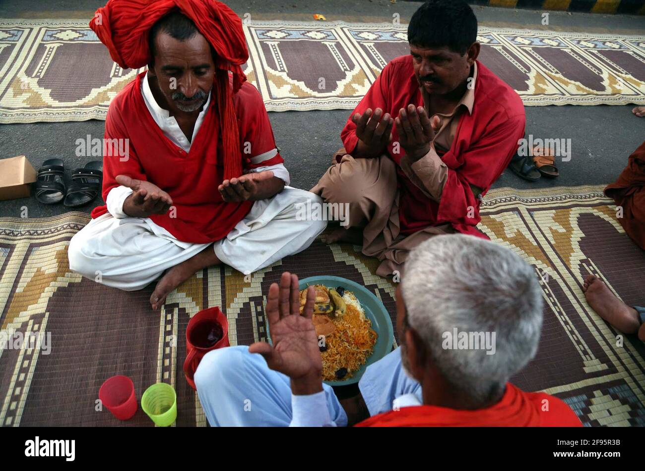 Faithful Muslims are breaking the fast (Iftar) during the Holy month of ...