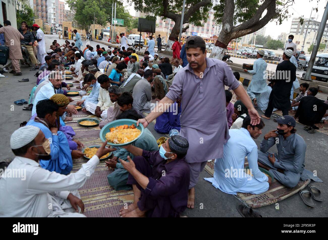 Faithful Muslims are breaking the fast (Iftar) during the Holy month of ...