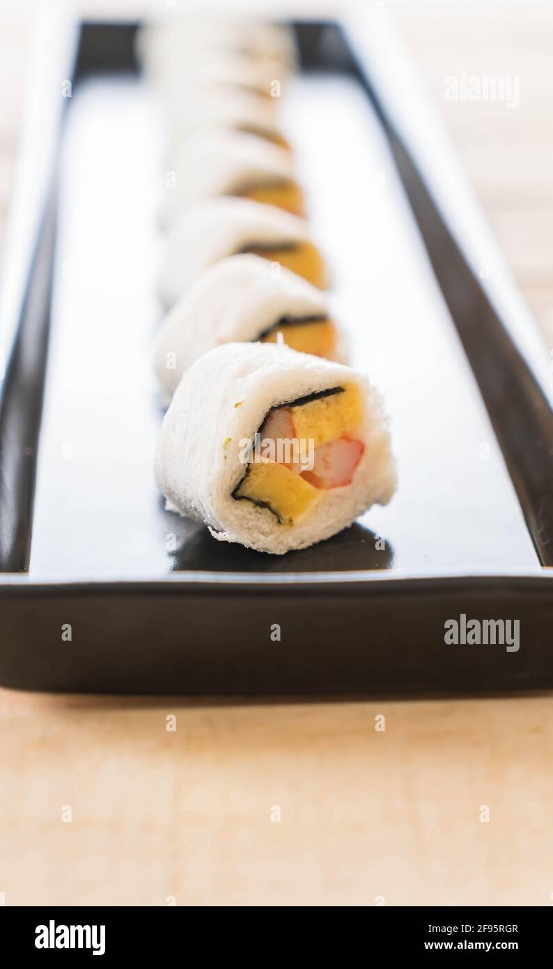 sushi sandwich roll - fusion food Stock Photo - Alamy