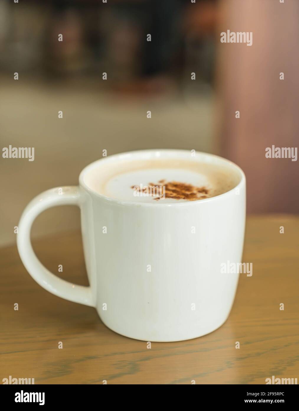 Coffee cup in coffee shop Stock Photo - Alamy