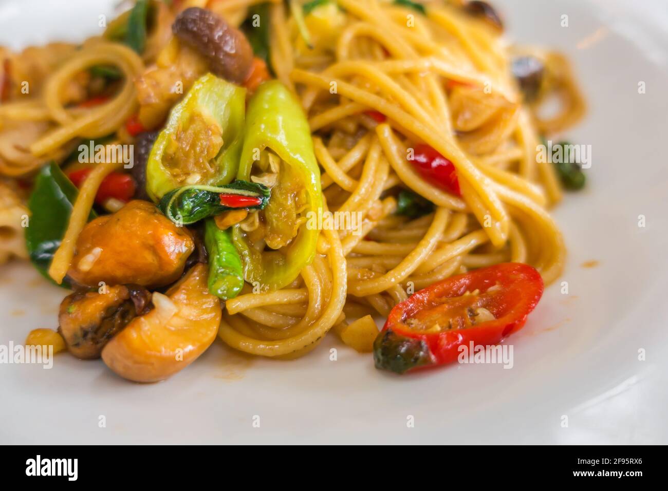 Spicy spaghetti with seafood Stock Photo - Alamy