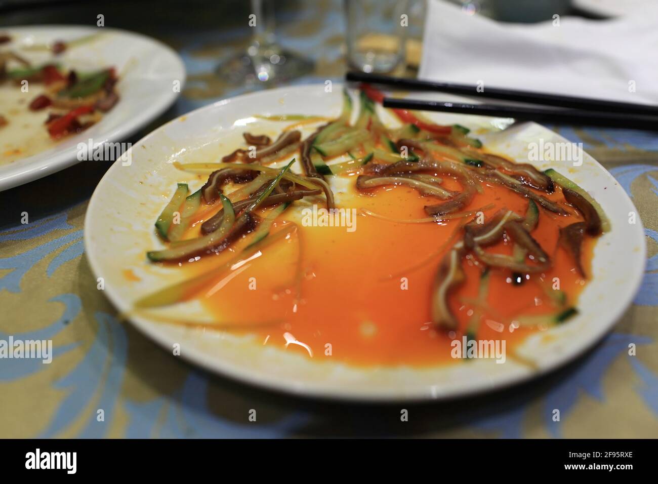 Leftovers of pig ears in a chinese restaurant Stock Photo - Alamy