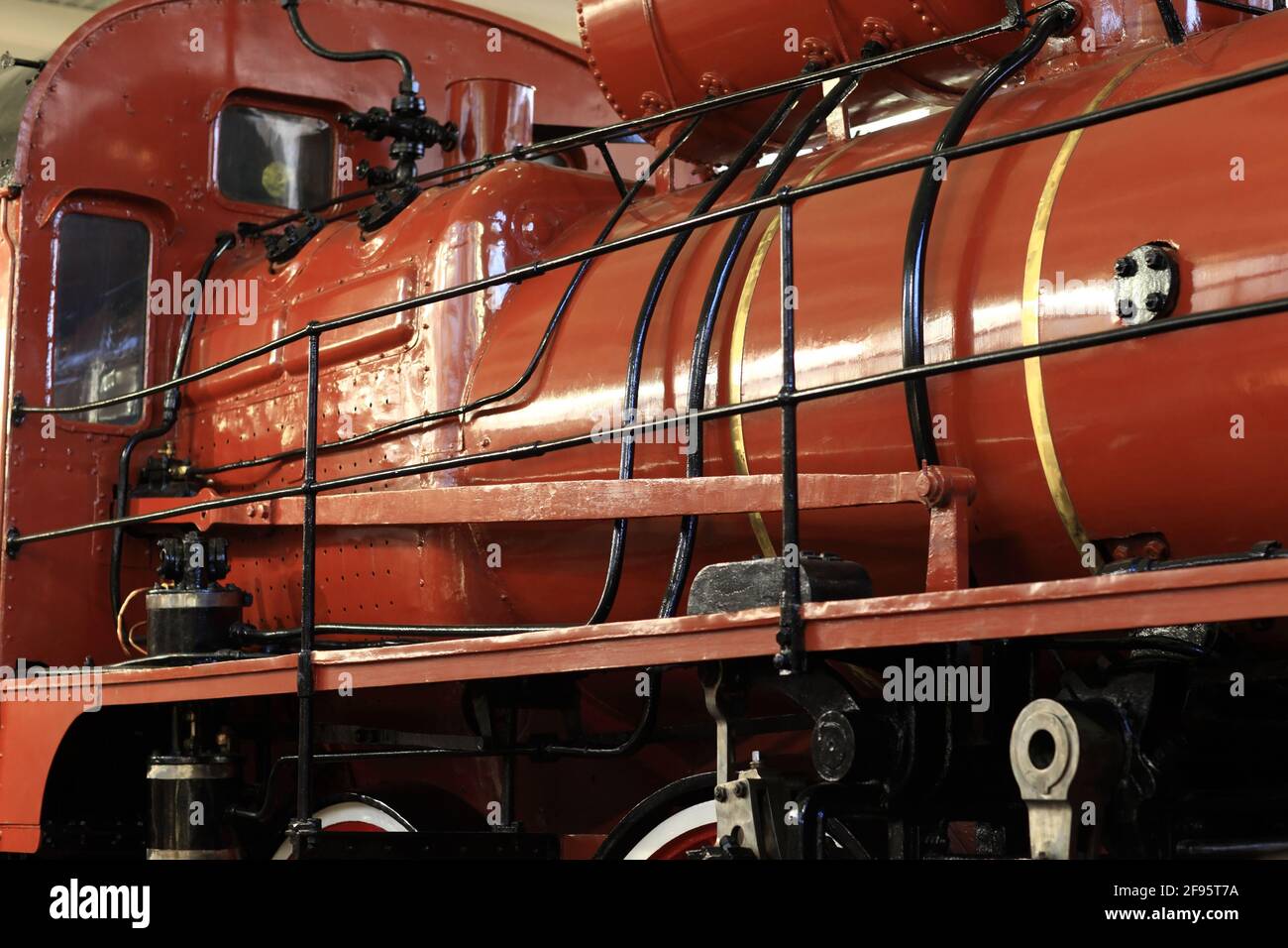 Old red steam locomotive in a museum Stock Photo - Alamy
