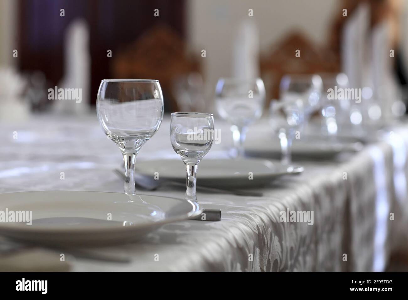 Table setting with glasses for a banquet in a restaurant Stock Photo ...