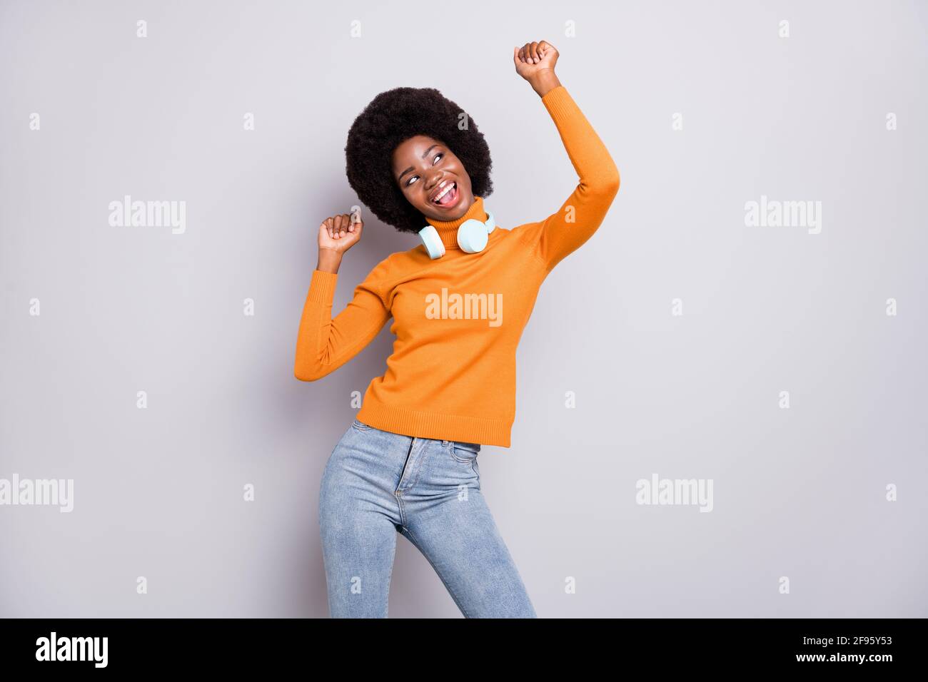 Photo portrait of afro american girl dancing with headphones on neck ...
