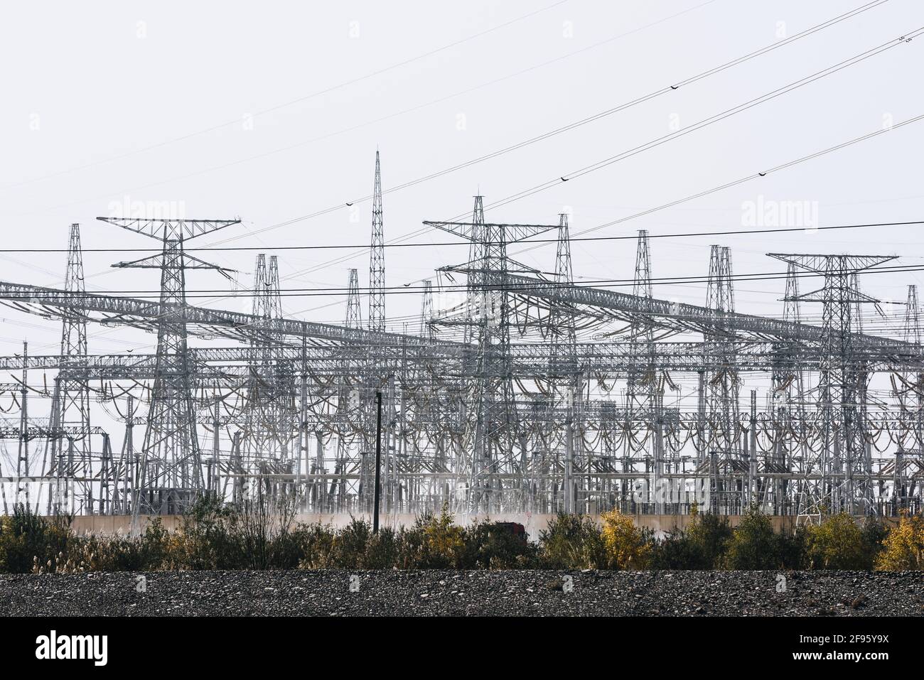 A substation with many high voltage pylons in Xinjiang, China Stock ...