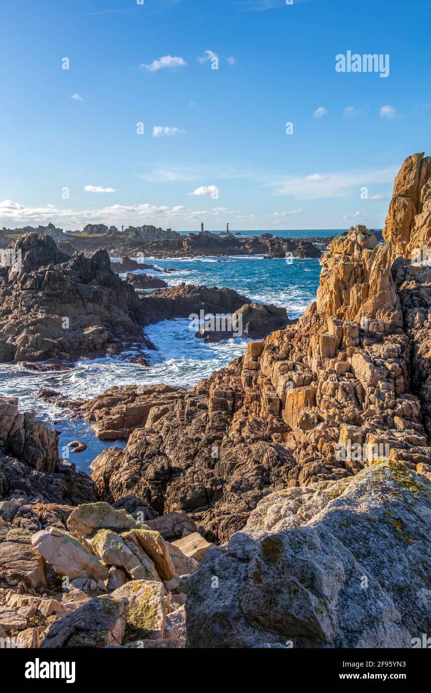 Lighthouses of the Phare de Nividic on the rocky coast of the Ushant ...