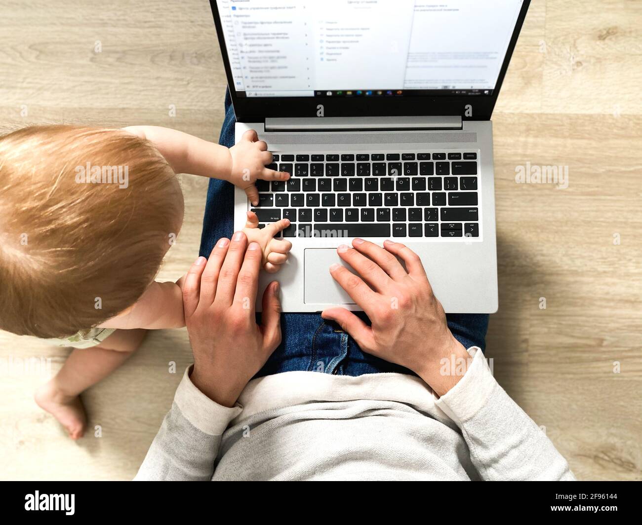 Baby working on laptop hi-res stock photography and images - Alamy